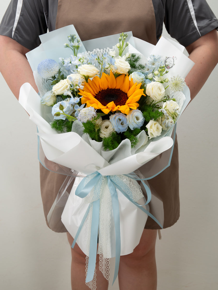 Julius | Sunflower Hand Bouquet With Blue Eustomas & Delphinium ...